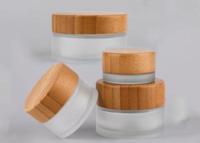China Empty 1oz 5g 10g 15g 20g 50g 100g 30g Eye Cream Frosted Cosmetic Glass Jar with Bamboo Wood Cap Lid for sale