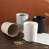 China Matte Embossed Empty Ceramic Candle Jar Multi Colored With Wooden Lids for sale