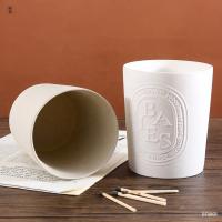 China Matte Embossed Empty Ceramic Candle Jar Multi Colored With Wooden Lids for sale