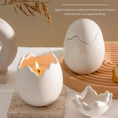 China Egg Shape Ceramic Candle Container 100ml with Lid for Home Decoration and Gift for sale