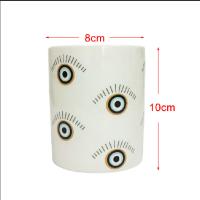 China Eye Pattern Candle Ceramic Containers With Letterpress Printing Gravure Printing for sale