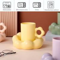 China Matte Nordic Ceramic Cappuccino Cup 250ml Flower Shape Porcelain Coffee Mug with Saucer for sale