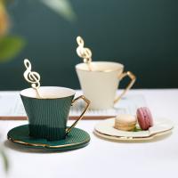 China Custom Gold Plated Ceramic Cup with Saucer 200ml Wholesale Modern Irregular Coffee Tea Cups for sale