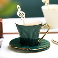 China Custom Gold Plated Ceramic Cup with Saucer 200ml Wholesale Modern Irregular Coffee Tea Cups for sale