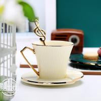 China Custom Gold Plated Ceramic Cup with Saucer 200ml Wholesale Modern Irregular Coffee Tea Cups for sale
