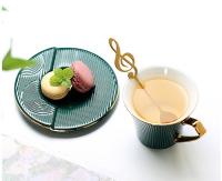 China Custom Gold Plated Ceramic Cup with Saucer 200ml Wholesale Modern Irregular Coffee Tea Cups for sale