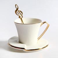China Custom Gold Plated Ceramic Cup with Saucer 200ml Wholesale Modern Irregular Coffee Tea Cups for sale