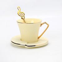 China Custom Gold Plated Ceramic Cup with Saucer 200ml Wholesale Modern Irregular Coffee Tea Cups for sale