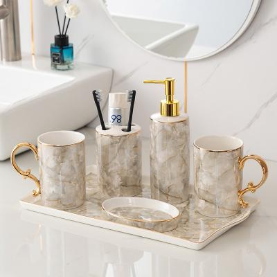 China Ceramic Soap Dispenser Set 5 Piece Round Shape Glazed Eco Friendly Bathroom Accessories for sale