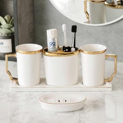China 5-Piece Ceramic Bathroom Set Soap Dispenser Toothbrush Holder Tumbler Soap Dish for sale