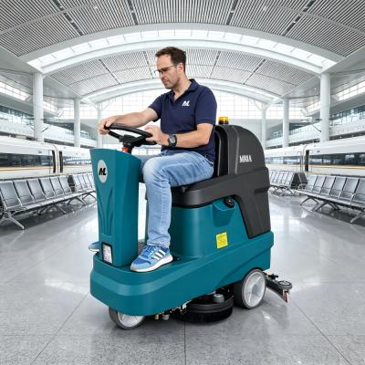 China Industrial Ride-on Floor Scrubber 120rpm Brush Speed Powerful Suction 400W Large Capacity Tanks for sale