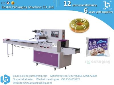 China Hot selling automatic candydoughnut breadlollipoptowel packing machine, horizontal pillow packing machine for sale