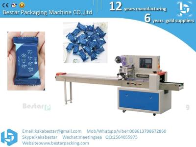 China Automatic Compressed Facial Mask Rotary Packing Machine 220V 50Hz for sale