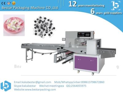 China Automatic Flow Packing Machine with Feeder for Small Food and Face Mask Packaging 220V for sale