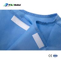China Disposable SMS Surgical Isolation Gown 25-70g Blue Waterproof Protective Suit for sale