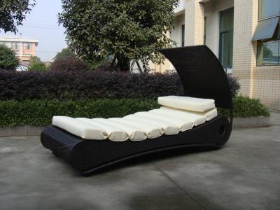 China Comfortable Roofed Black Rattan Sun Lounger With White Cushion for sale