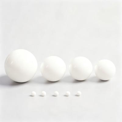 China Wear Resistant Al2O3 Ball High Hardness Alumina Ceramic Grinding Balls Mirror Polished for sale