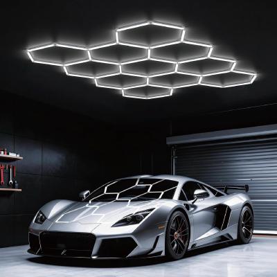 China LED Hex Light Hexagon Panel Lighting System Modular Connectable Honeycomb Ceiling Lights For Home Garage Studio Office for sale