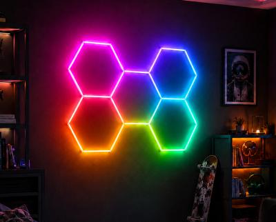China RGB LED Hexagon Light Modular Ceiling Lighting System for Garage Gym Workshop Office Connectable Honeycomb LED Hex Light Panels for sale
