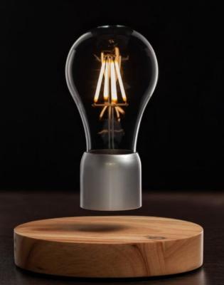 China round base wireless magnetic levitation desk lamp light night bulb for sale