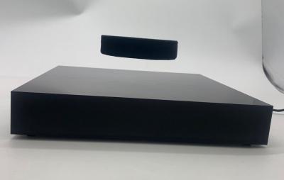 China wireless charging rechargeable levitation floating bottle display stand with inducation tray for sale