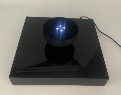 China wireless charging rechargeable levitation floating bottle display stand with inducation tray for sale