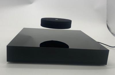 China wireless charging rechargeable levitation floating bottle display stand with inducation tray for sale