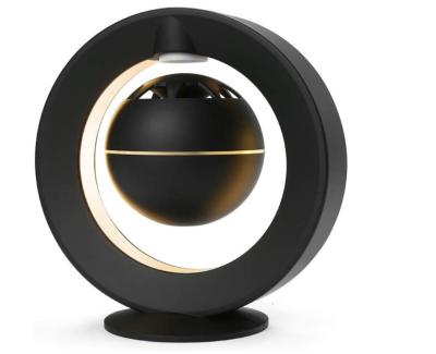 China 360 rotating led light magnetic levitation floating wireless bluetooth speaker for gift for sale