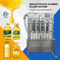 China Food Grade Anti-drip Filling Nozzle Semi-Automatic 4 Head Piston Oil Filling Machine for Soybean Oil Olive Oil Blended Oil for sale