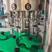 China Full Automatic Rotary Liquid Filling Machine 2000 BPH Glass Bottle Juice Vacuum Filler Fruit Vinegar Bottle Filling Machine for sale