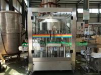 China 1800-8000BPH Customizable Heads Automatic Wine Gravity Filler Machine with Liquid Canning for sale