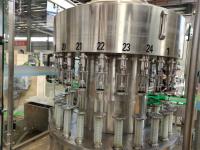 China Automatic Counter Pressure Filling Rotary Filler Machine for Grape Wine Bottling Machine with Liquid Canning for sale