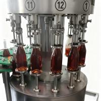 China Automatic Counter Pressure Filling Rotary Filler Machine for Grape Wine Bottling Machine with Liquid Canning for sale