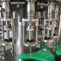 China Automatic Counter Pressure Filling Rotary Filler Machine for Grape Wine Bottling Machine with Liquid Canning for sale
