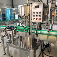 China Automatic Tracking Vacuum Filling Machine for 300ml Plastic Bottle Wine Vinegar Mineral Water With Conveyor Belt for sale