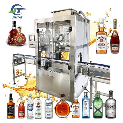 China Full Automatic  Don Julio Tequila Jack Daniel's Whiskey Negative Pressure Liquid Bottling Filling Machine for sale