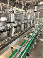 China 6 Nozzle Fully Automate Tracking Linear Filling Machine Plastic Glass Bottle Engine Grease Oil Bottling Filling Line for sale