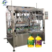 China Full Automatic Quantitative Jerrycan Honey Oil Viscous Liquid Filling Machine with Conveyor for sale