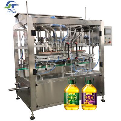 China Full Automatic Quantitative Jerrycan Honey Oil Viscous Liquid Filling Machine with Conveyor for sale