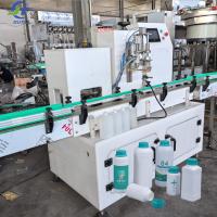 China Automatic 2 Nozzles Magnetic Liquid Filling Machine Conveyor Anti Corrosion Detergent Chemical Hypochlorite Plastic Bottle for sale