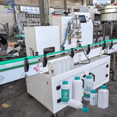 China Automatic 2 Nozzles Magnetic Liquid Filling Machine Conveyor Anti Corrosion Detergent Chemical Hypochlorite Plastic Bottle for sale