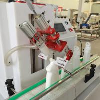 China Automatic 2 Head Pet Bottle Bleach and Toilet Cleaner Liquids Filling Machine with Convey Line for sale