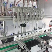 China Full Automatic Acids Chemical Liquid 1000ml 8 Head Plastic Bottle Toilet Bowl Cleaner Filling Machine with Conveyer Belt for sale