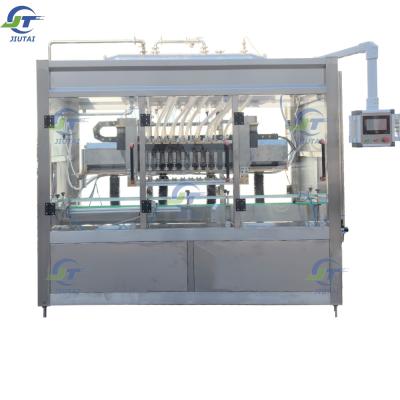 China Full Automatic Tracking Spirit Bottle Filling Machine for Coconut Juice Pet Bottle With Conveyor and Hopper for sale