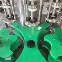 China Full Automatic Electric 12 Head Rotary Bottle Pesticide/Spirit Filling Packing Machine for Small Business for sale