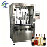China Red Wine Spirits Alcohol Liquor Glass Bottle Level Filling Automatic Single Head Tracking Vacuum Filling Machine for sale