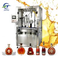 China Distilled Spirit Moonshine Vodka Liquor Level Filling Automatic Single Head Tracking Vacuum Filling Machine for sale