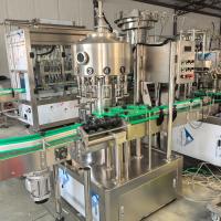 China 2000 BPH Automatic Digital Rotary Vacuum Liquid Filling Machine PLC-controlled Glass Bottle Juice Fruit Vinegar Filling Line for sale
