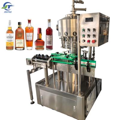 China 12 Head Electric Rotary PLC-controlled 220V High Precision Automatic Beverage Glass Bottle Alcohol Wine Liquid Filling Machine for sale