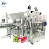 China Automatic Bags 4 Nozzle Ketchup Spout Stand up Pouch Filling Capping Machine for sale